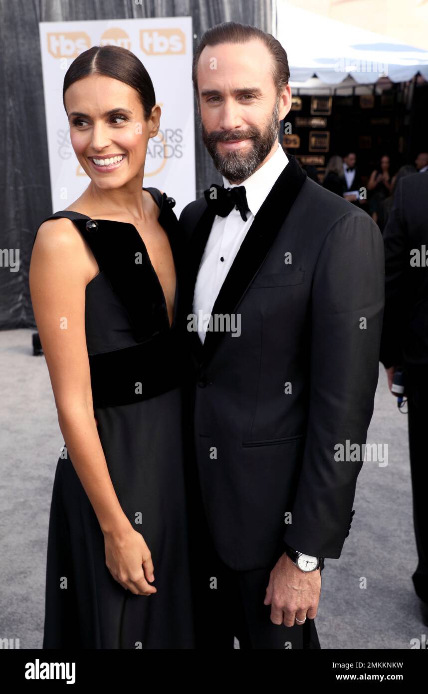 Maria Dolores Dieguez, left, and Joseph Fiennes arrive at the 25th ...
