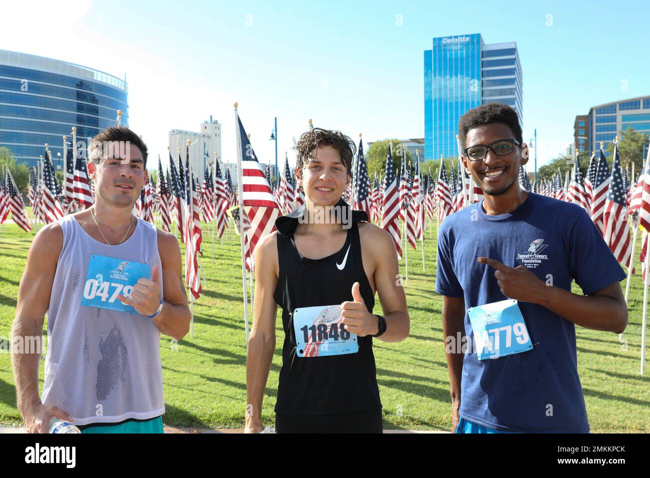 (From left to right) Second place finisher Kevin Nelson, first place ...