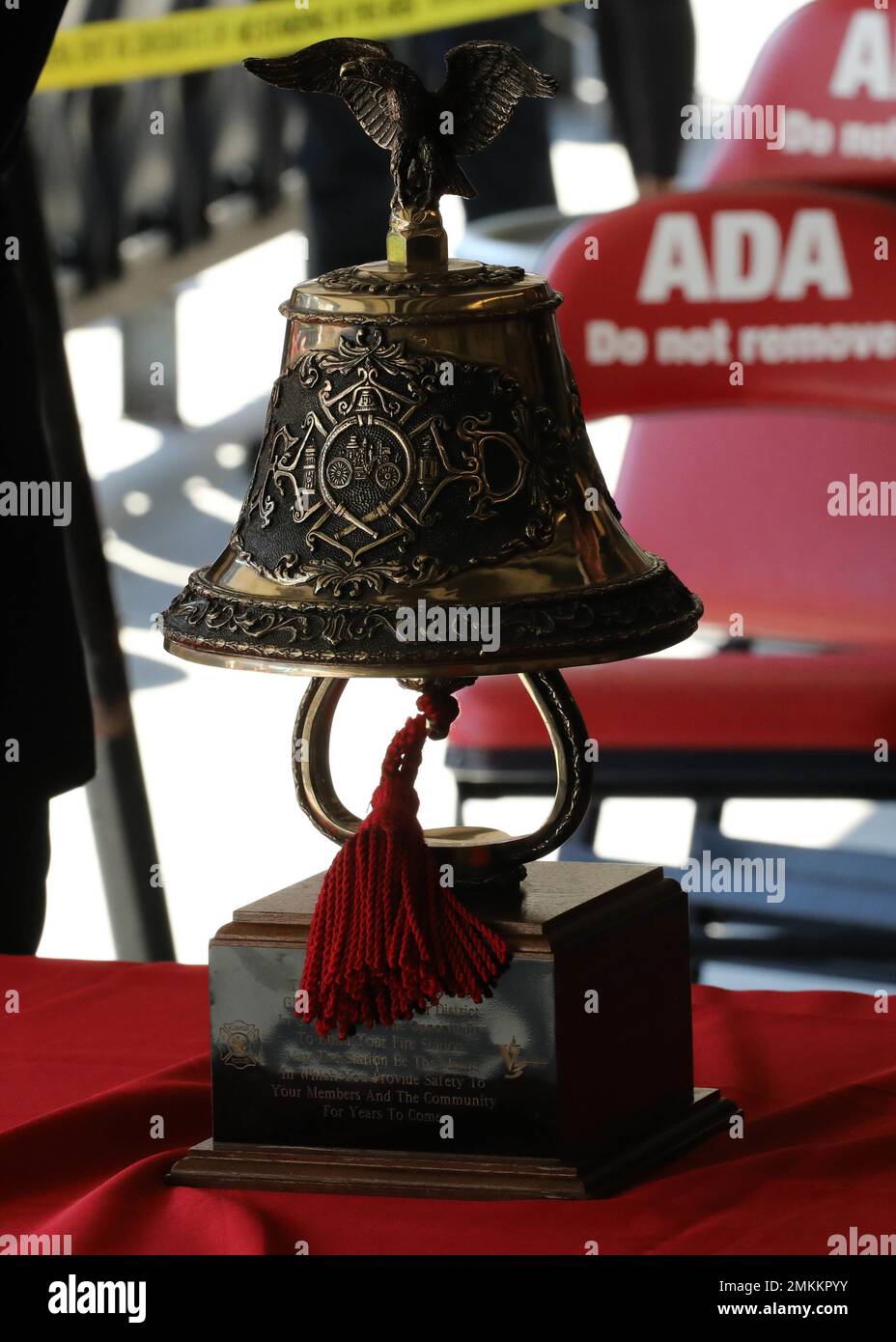A firehouse bell waits at the finish line of the Chicagoland 9/11 ...
