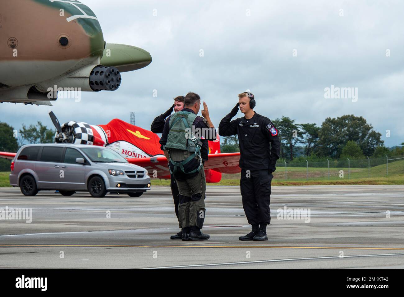 Maj. Haden Fullam, middle, the A-10 Demonstration Team pilot, salutes ...