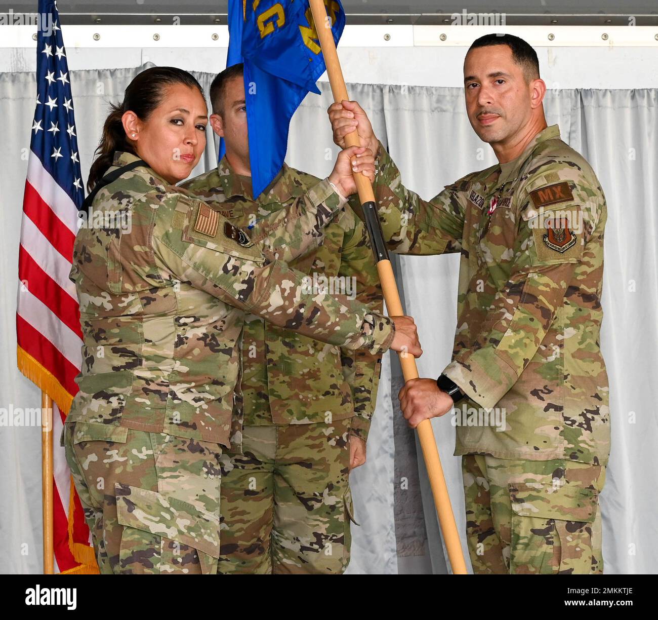 Lt. Col. Carla Martinez, 433rd Maintenance Group commander, presents ...