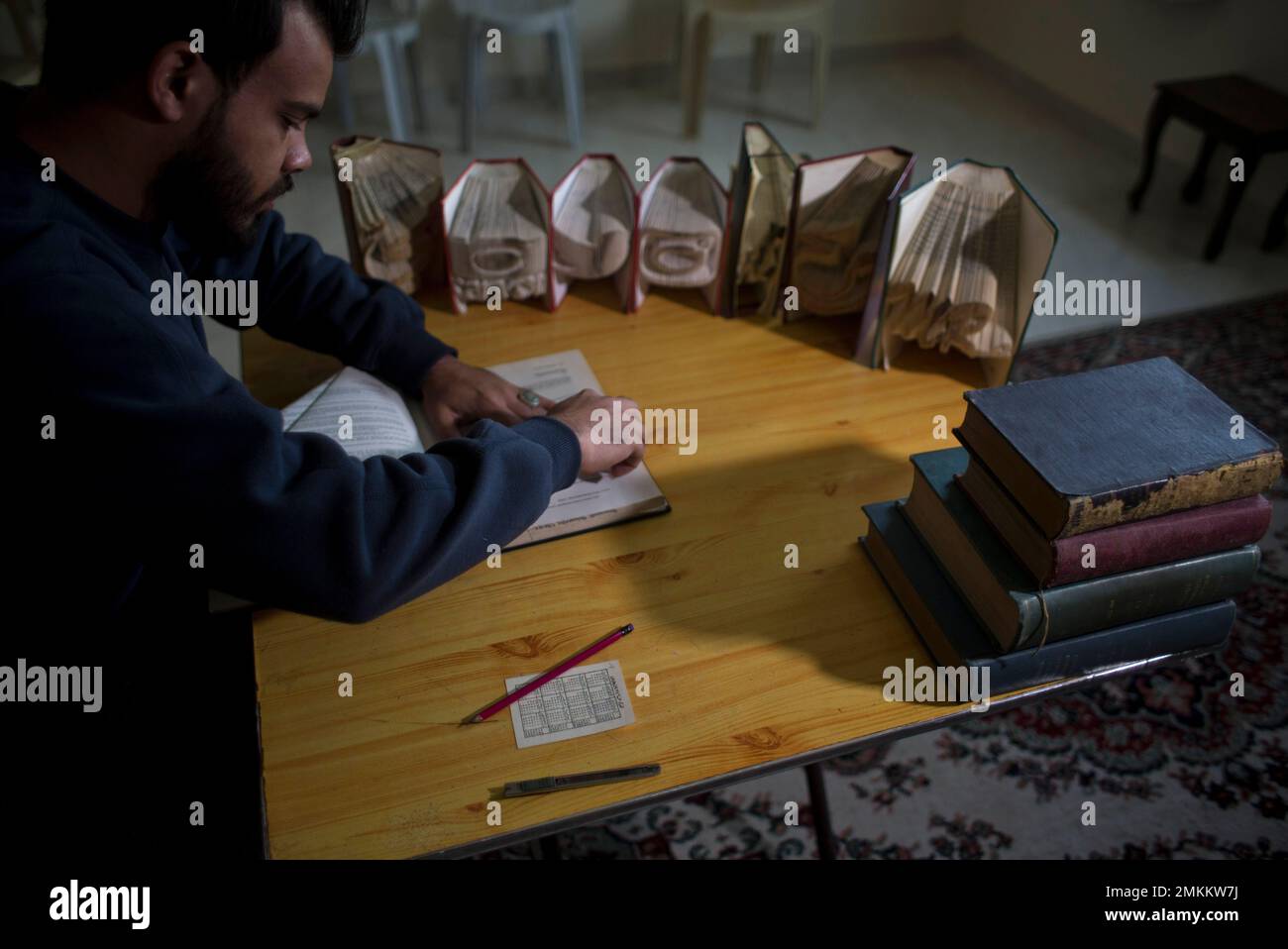 In this Wednesday Jan. 16, 2019 photo, Palestinian artist Ahmed Humaid ...