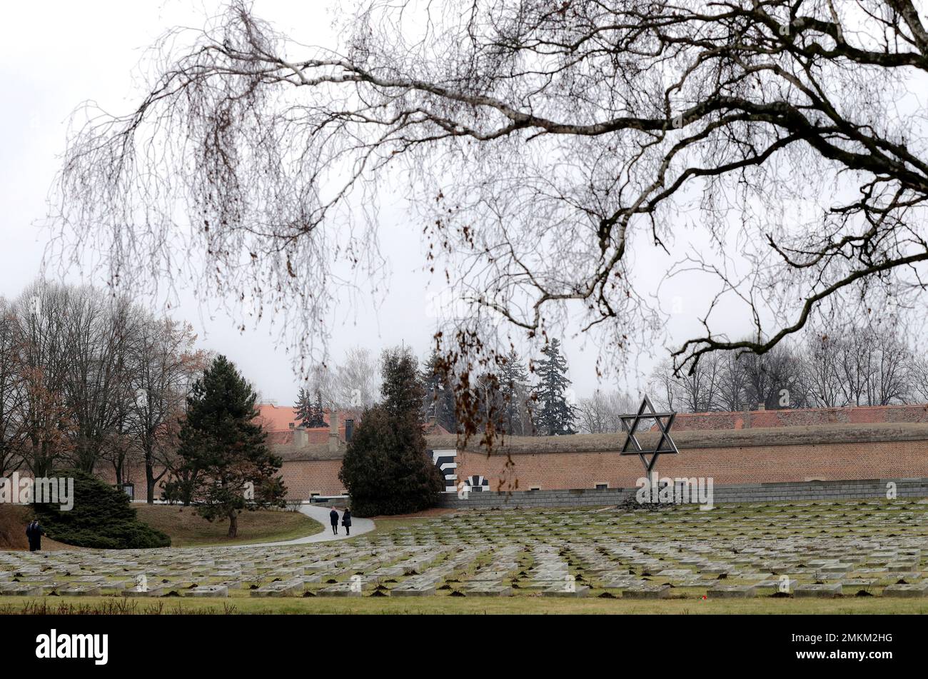 Visitors walk through the cemetery of the former Nazi concentration ...