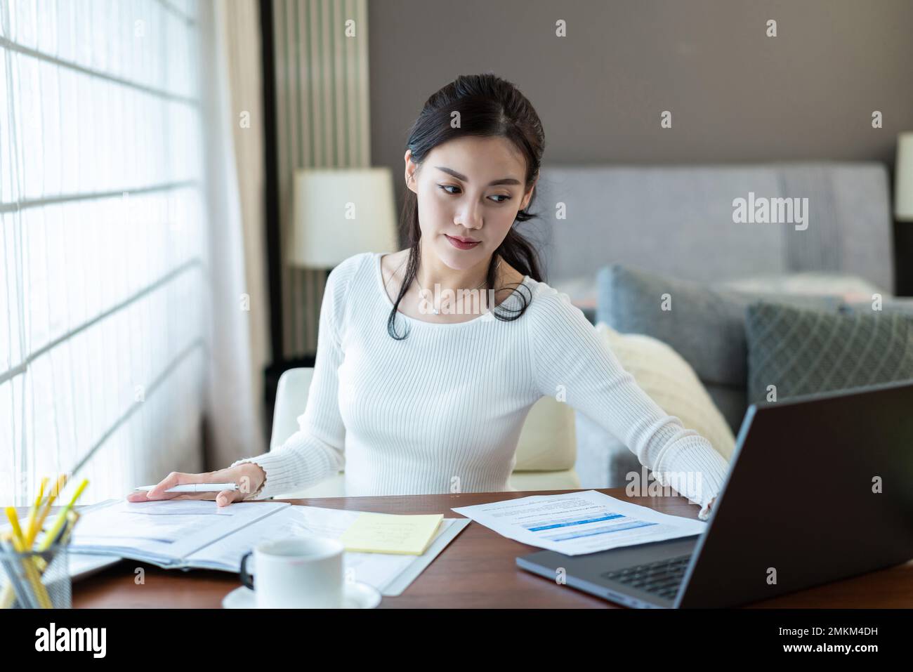 Business woman use the computer at the hotel Stock Photo - Alamy