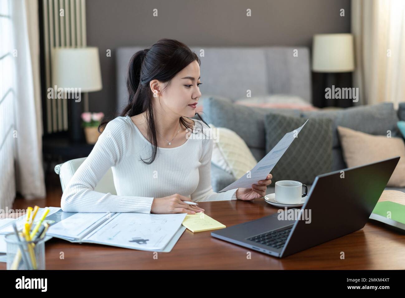 Business woman use the computer at the hotel Stock Photo - Alamy