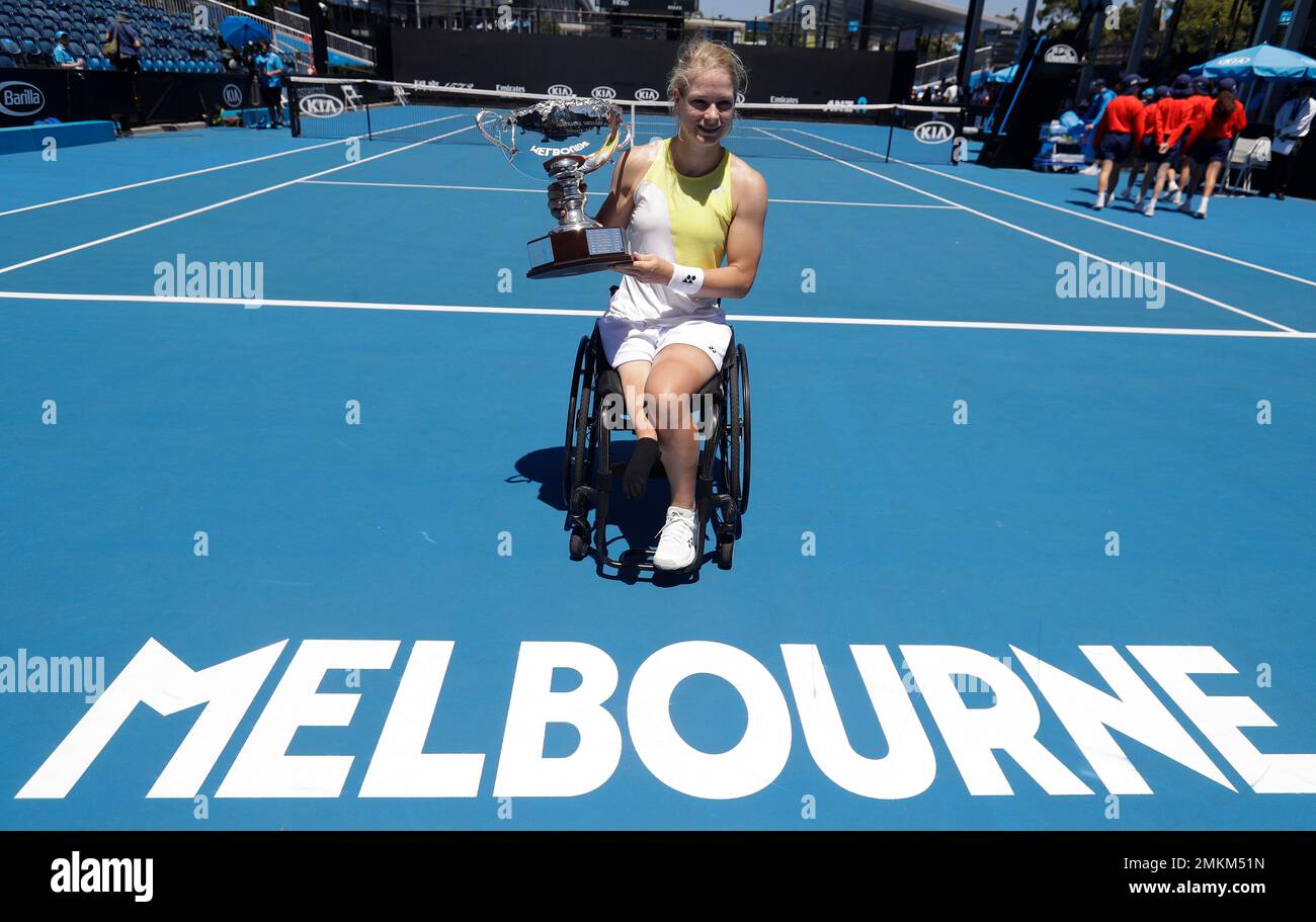Diede de Groot of the Netherlands holds her trophy after defeating ...