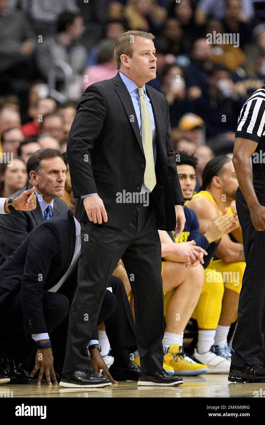 Marquette head coach Steve Wojciechowski stands on the court during the ...