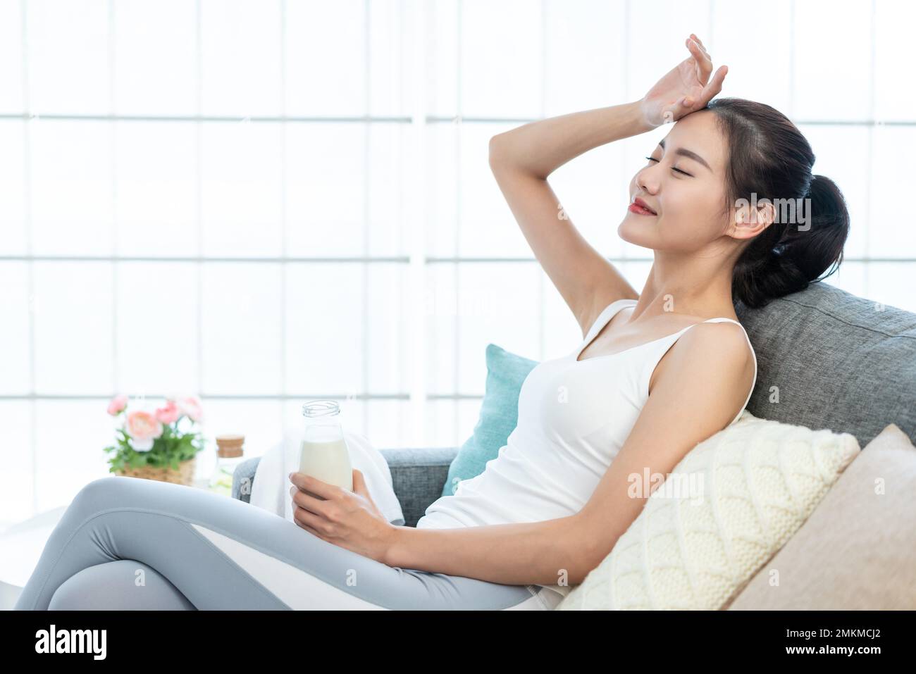 A young woman after a rest Stock Photo - Alamy