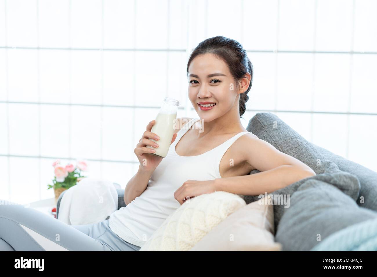 A young woman after a rest Stock Photo - Alamy