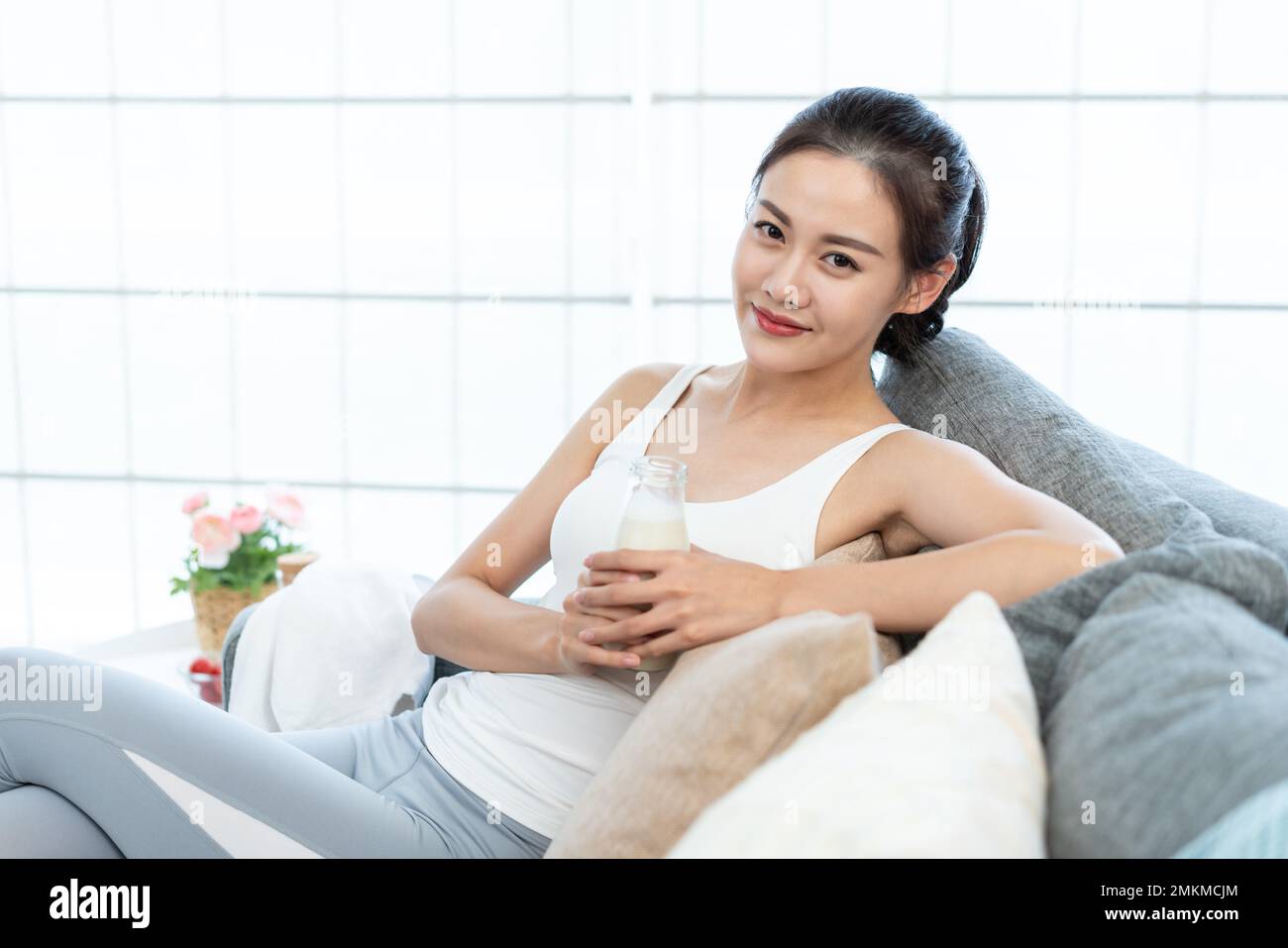 A young woman after a rest Stock Photo - Alamy