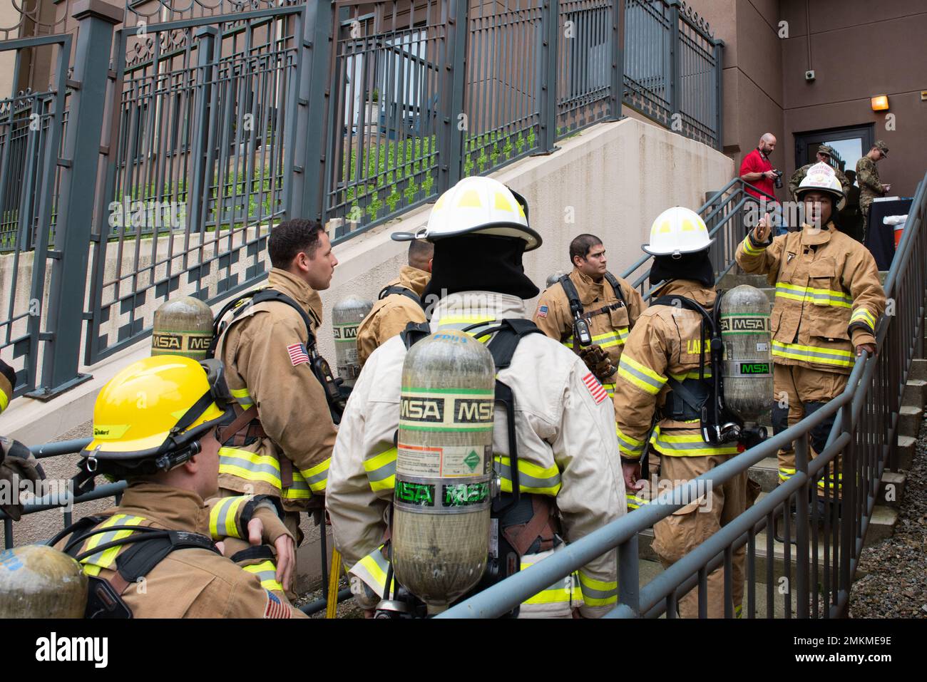 Participants receive directions for the annual stair climb challenge as ...