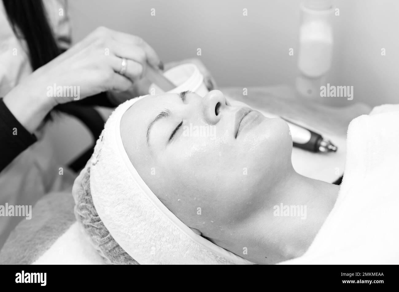 Applying cream and rubbing into skin, cosmetology relaxing procedure ...