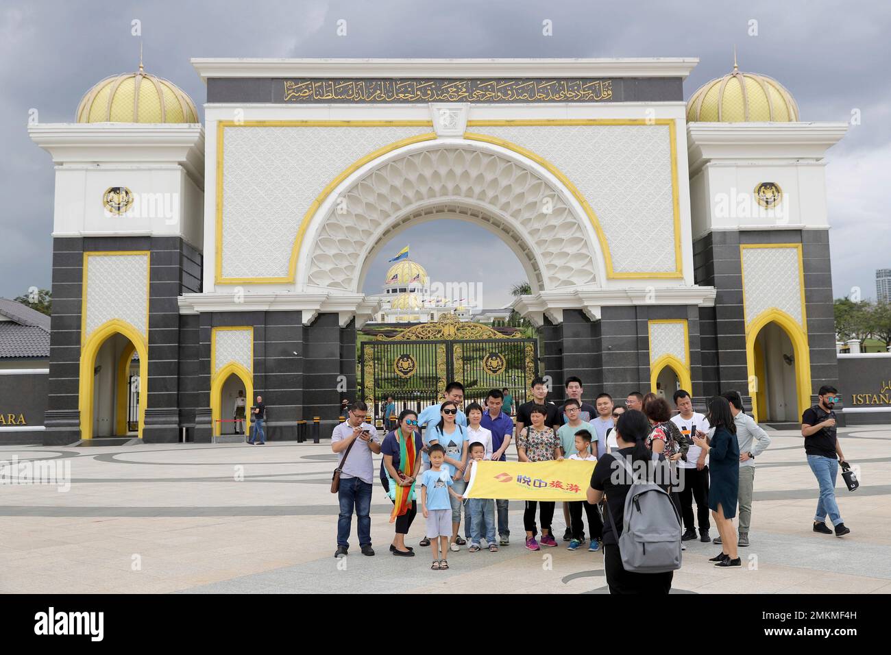 Tourists take photos in front of Malaysia National Palace in Kuala ...