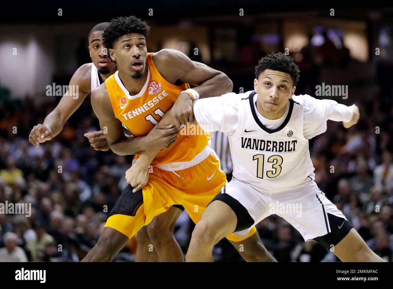 Tennessee forward Kyle Alexander (11) and Vanderbilt forward Matthew ...