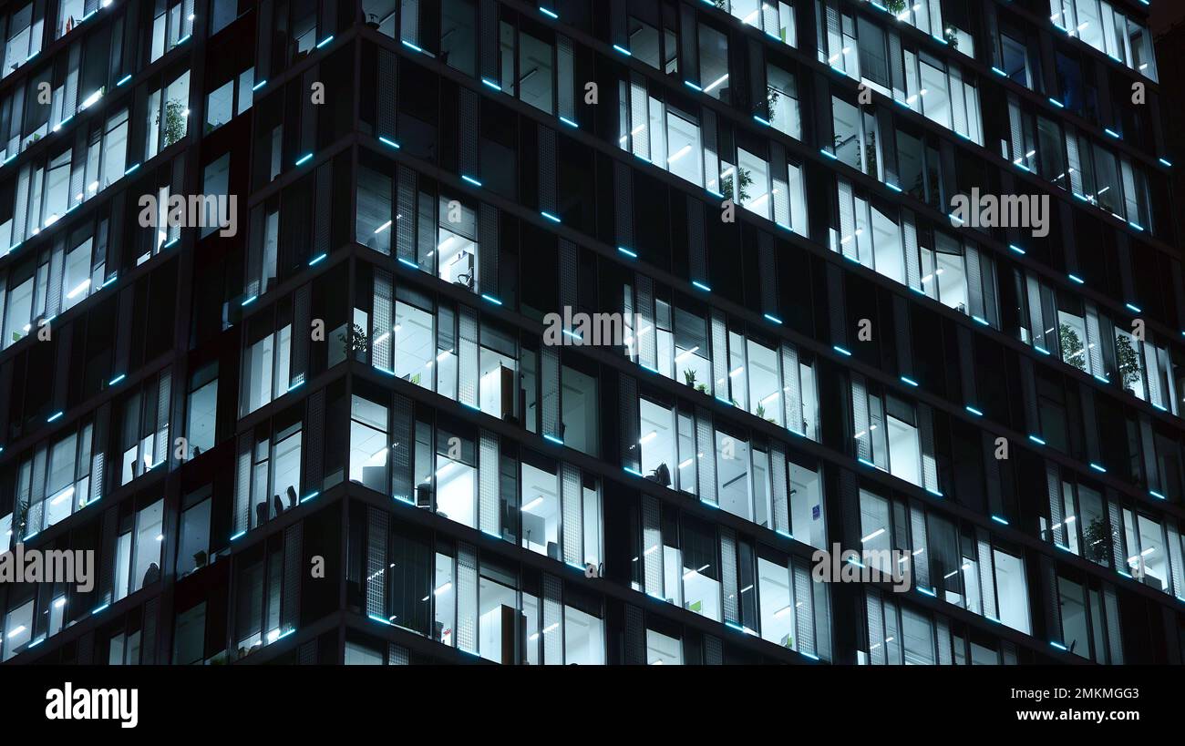 Corporate building at night - business concept. Glass wall office ...