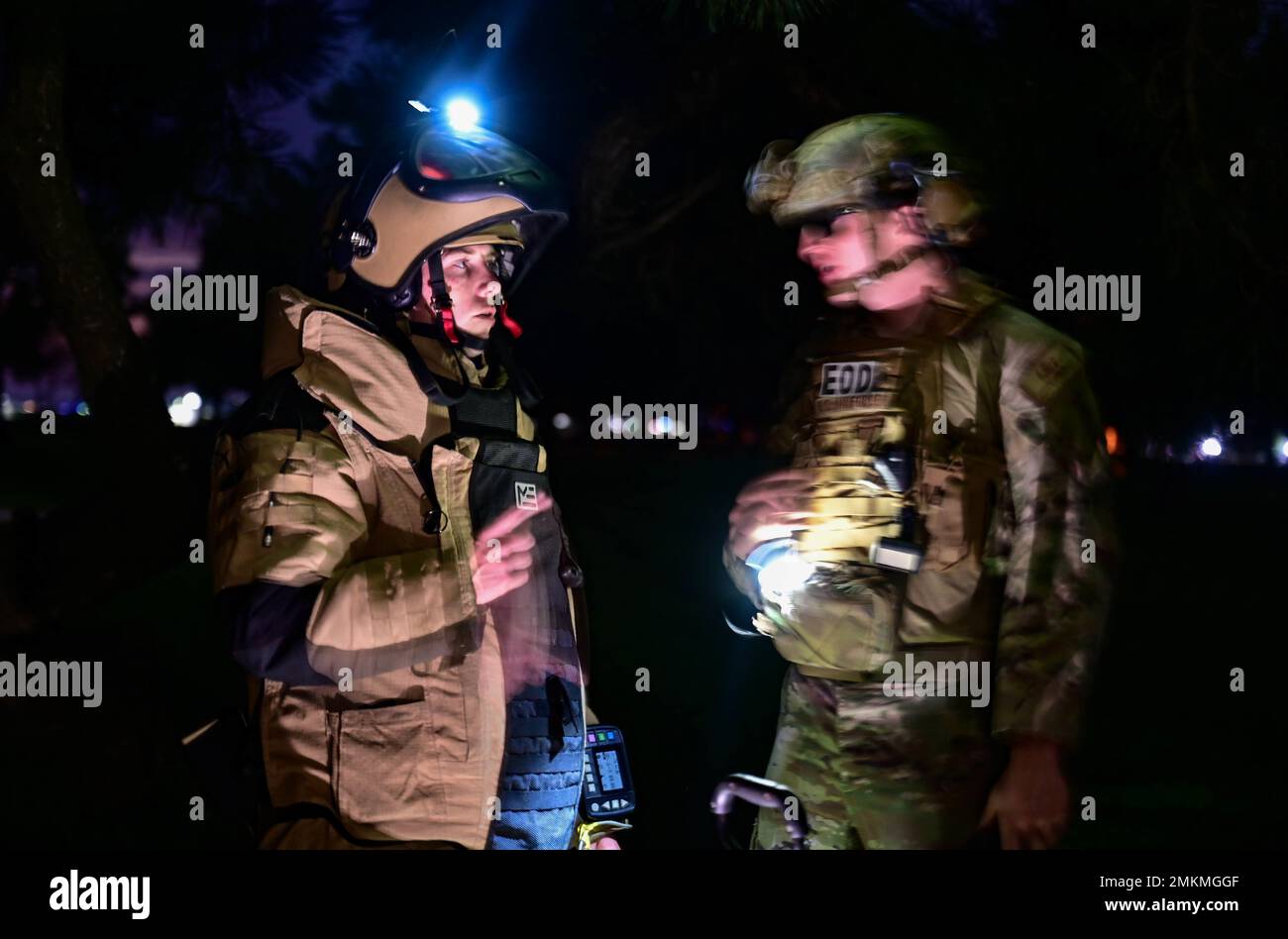 U.S. Air Force Staff Sgt. Jeremy Hobn (left), 8th Civil Engineer Squadron explosive ordnance ...