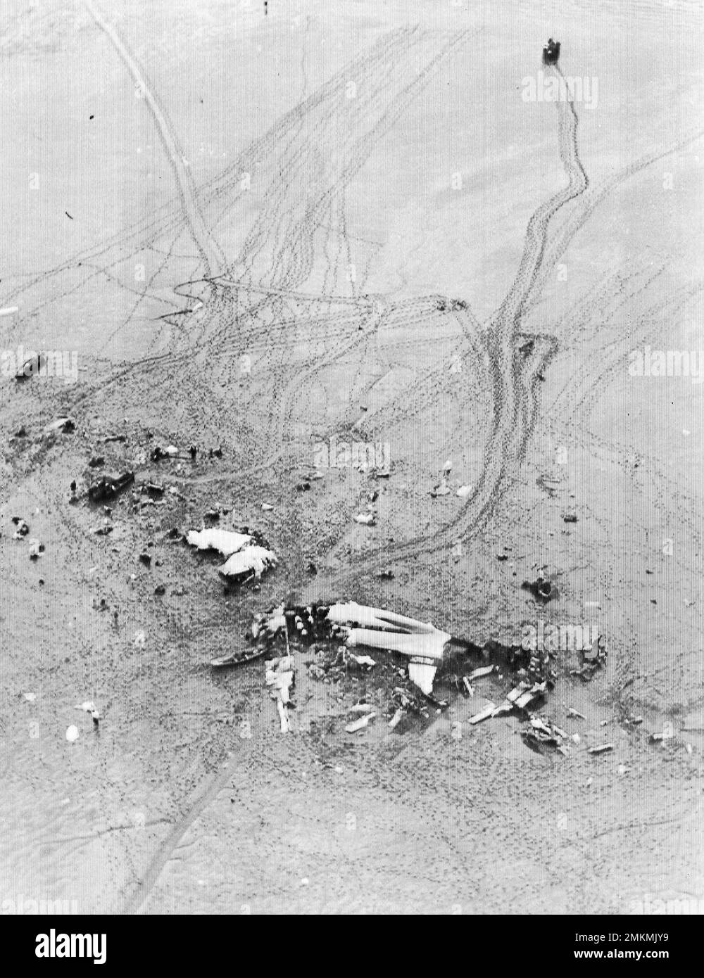 Aerial view of the wreckage of the DC-6 airliner is strewn on the bank ...