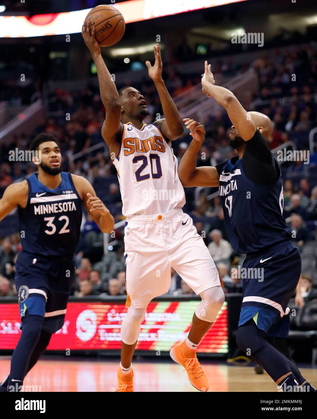 Phoenix Suns forward Josh Jackson (20) shoots between Minnesota ...