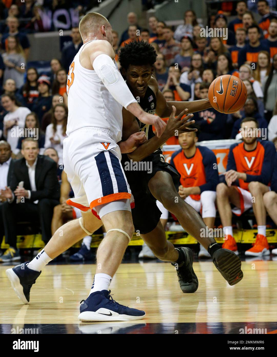 Wake Forest forward Jaylen Hoard, right, tries to get past Virginia ...
