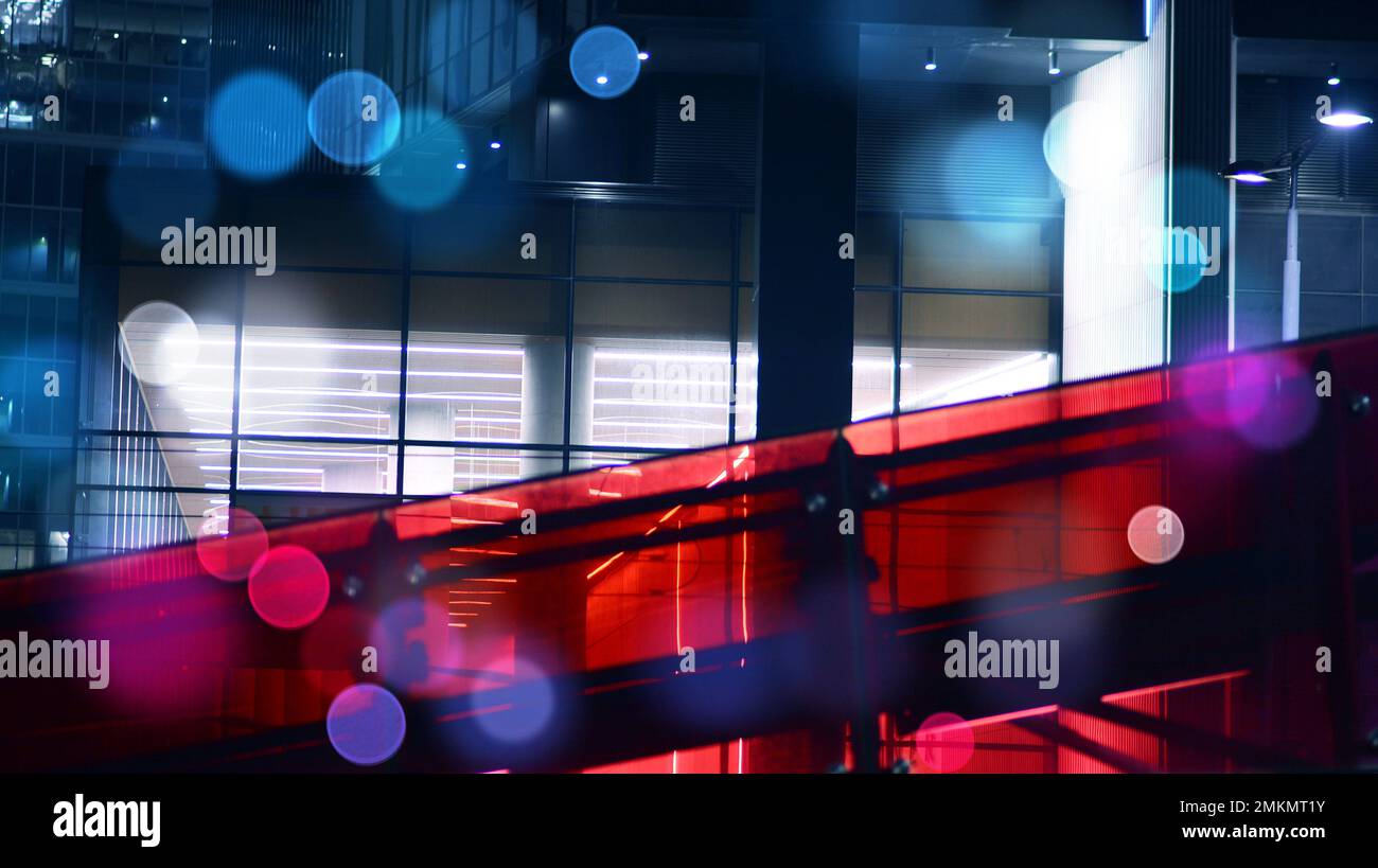 Pattern of office buildings windows illuminated at night. Glass ...