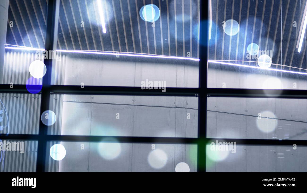 Pattern of office buildings windows illuminated at night. Glass ...