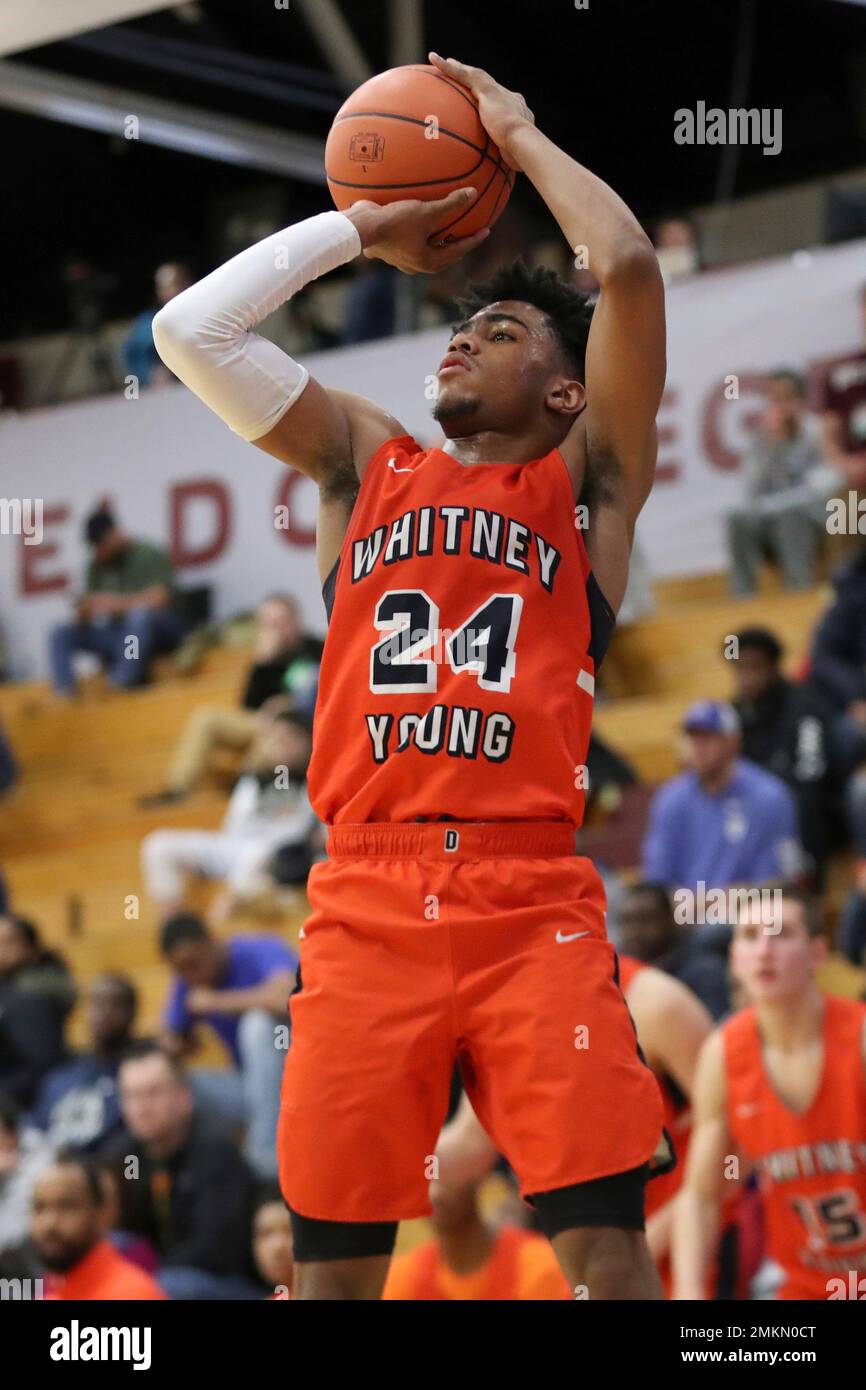 Whitney Young's Tyler Beard #24 in action against The Maret School ...