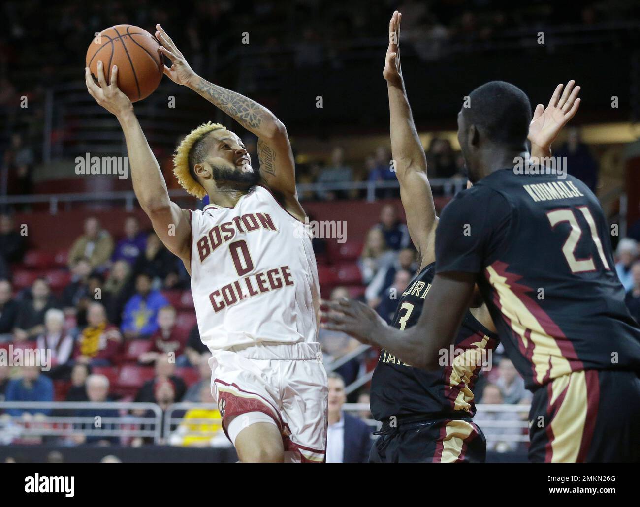 Boston College's Ky Bowman looks for an opening past Florida State's ...