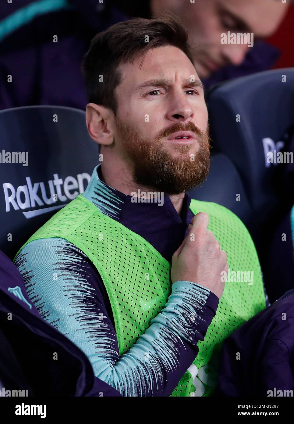 FC Barcelona's Lionel Messi gestures sitting on the bench during the ...