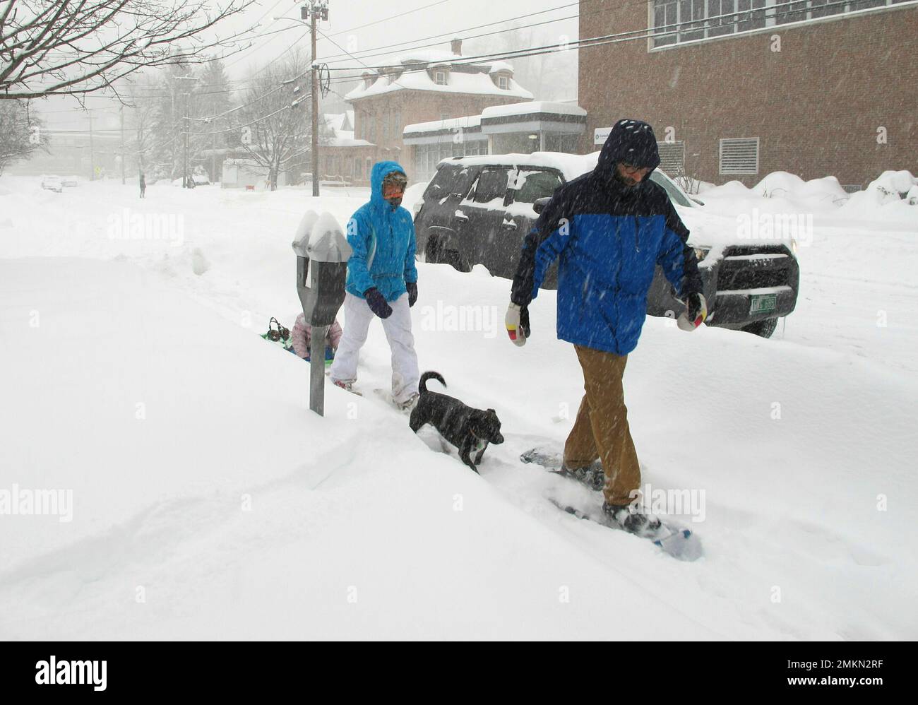 Will Roberts and his wife Julia Chafets snowshoe in downtown Montpelier ...