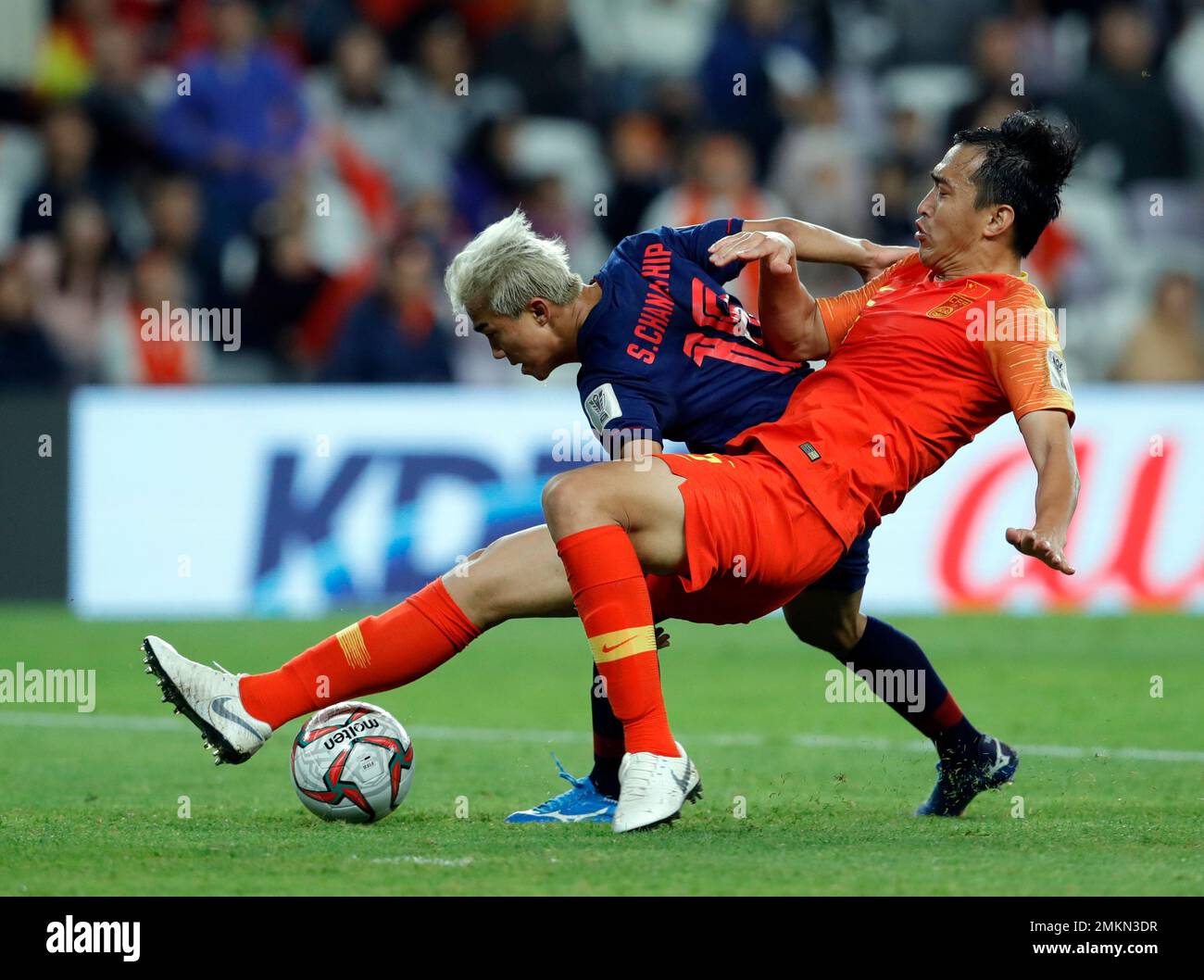 China's defender Feng Xiaoting, right, duels for the ball with Thailand ...