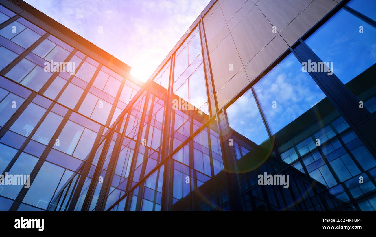 Abstract closeup of the glass-clad facade of a modern building covered ...