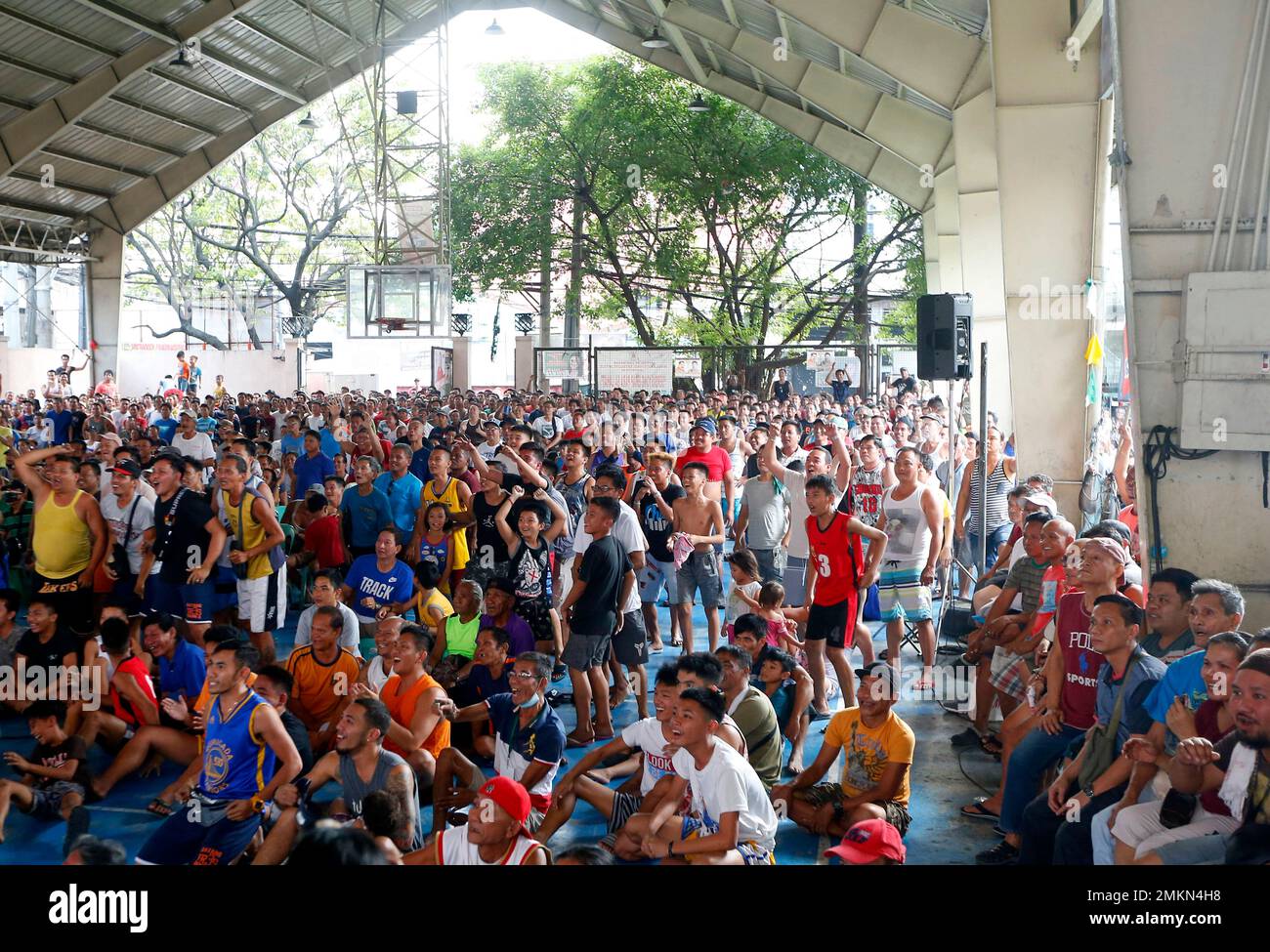 Fans cheer during the WBA Welterweight Championship boxing match ...