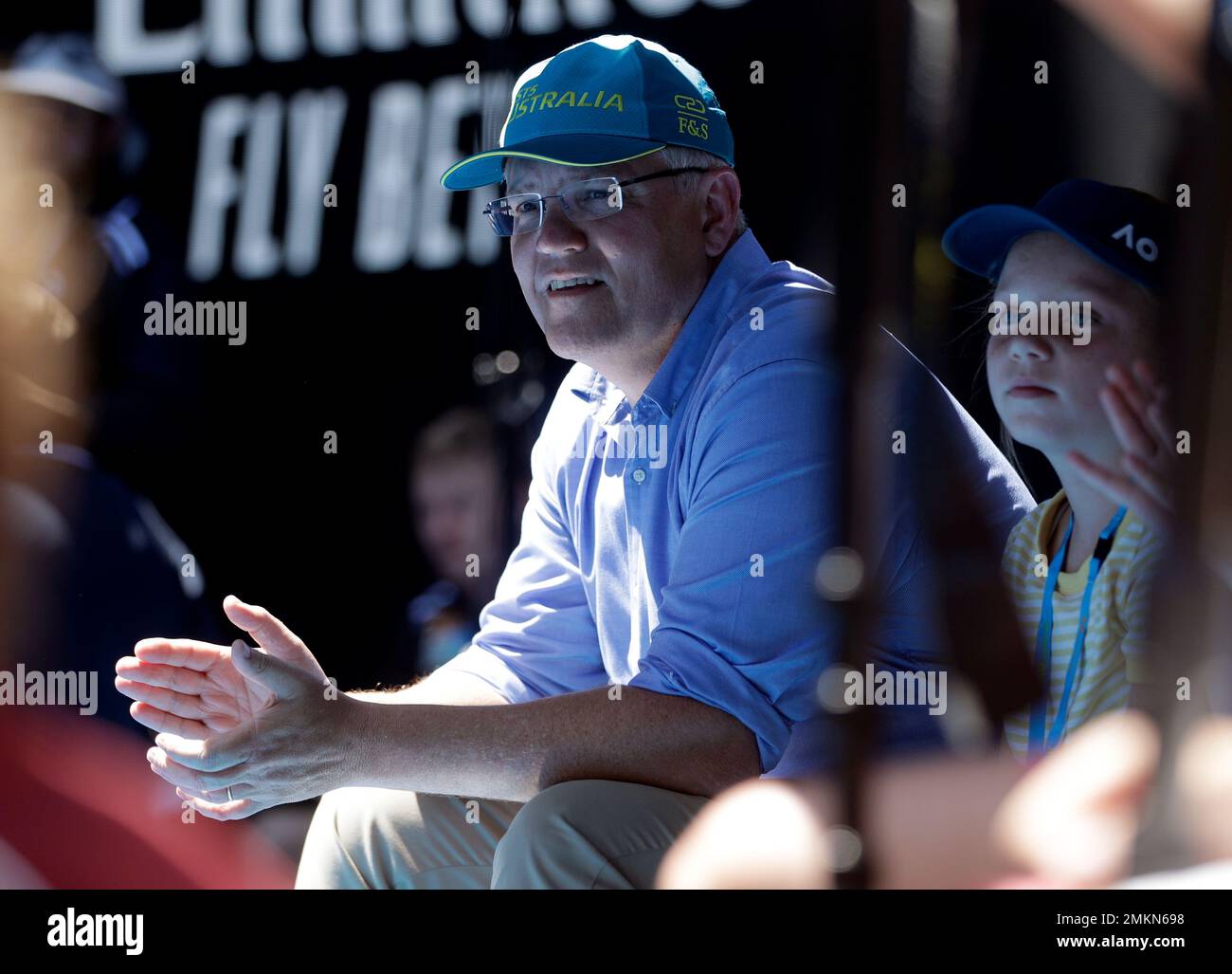 Australian Prime Minister Scott Morrison watches the fourth round match ...