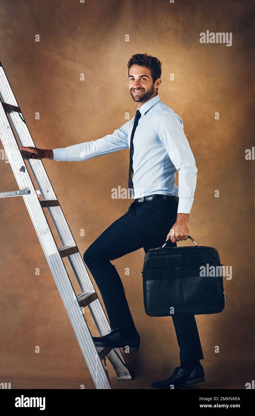 Man at top of ladder hi-res stock photography and images - Alamy