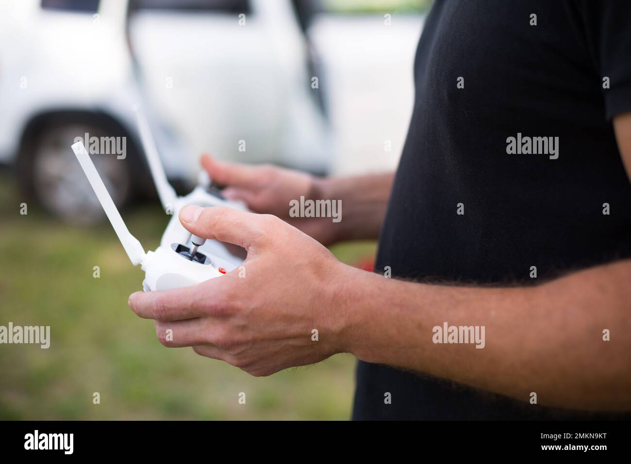 Quadrocopter control from a joystick with outdoor antennas. Shooting ...