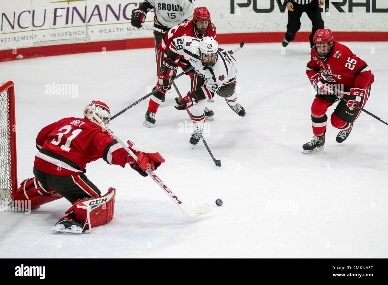 St. Lawrence's Arthur Brey (31) and Michael Laidley (25) and Brown's ...