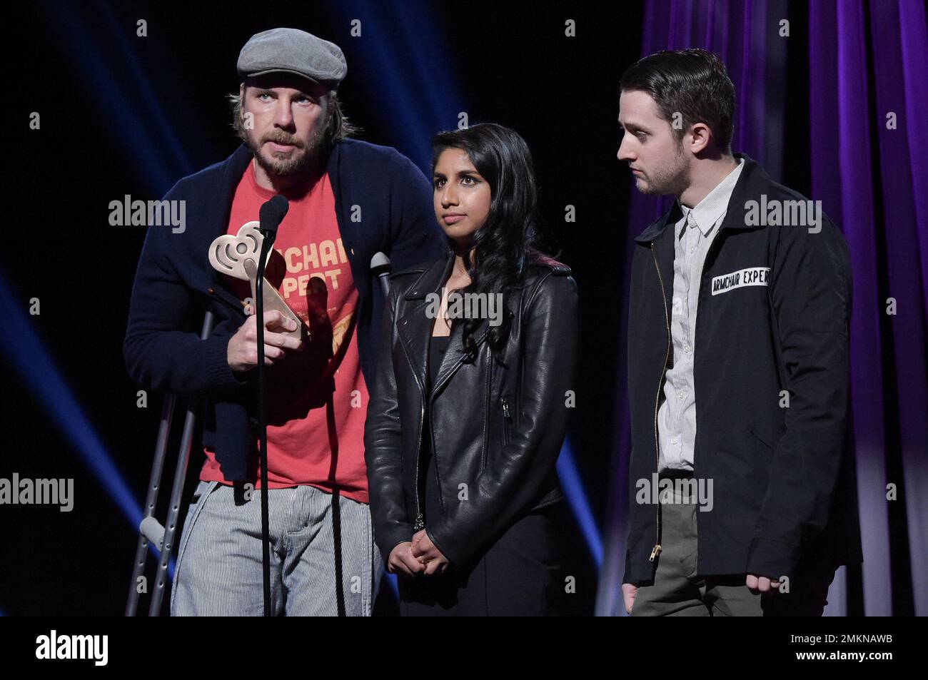 Dax Shepard, from left, Monica Padman and Rob Holysz receive the award ...
