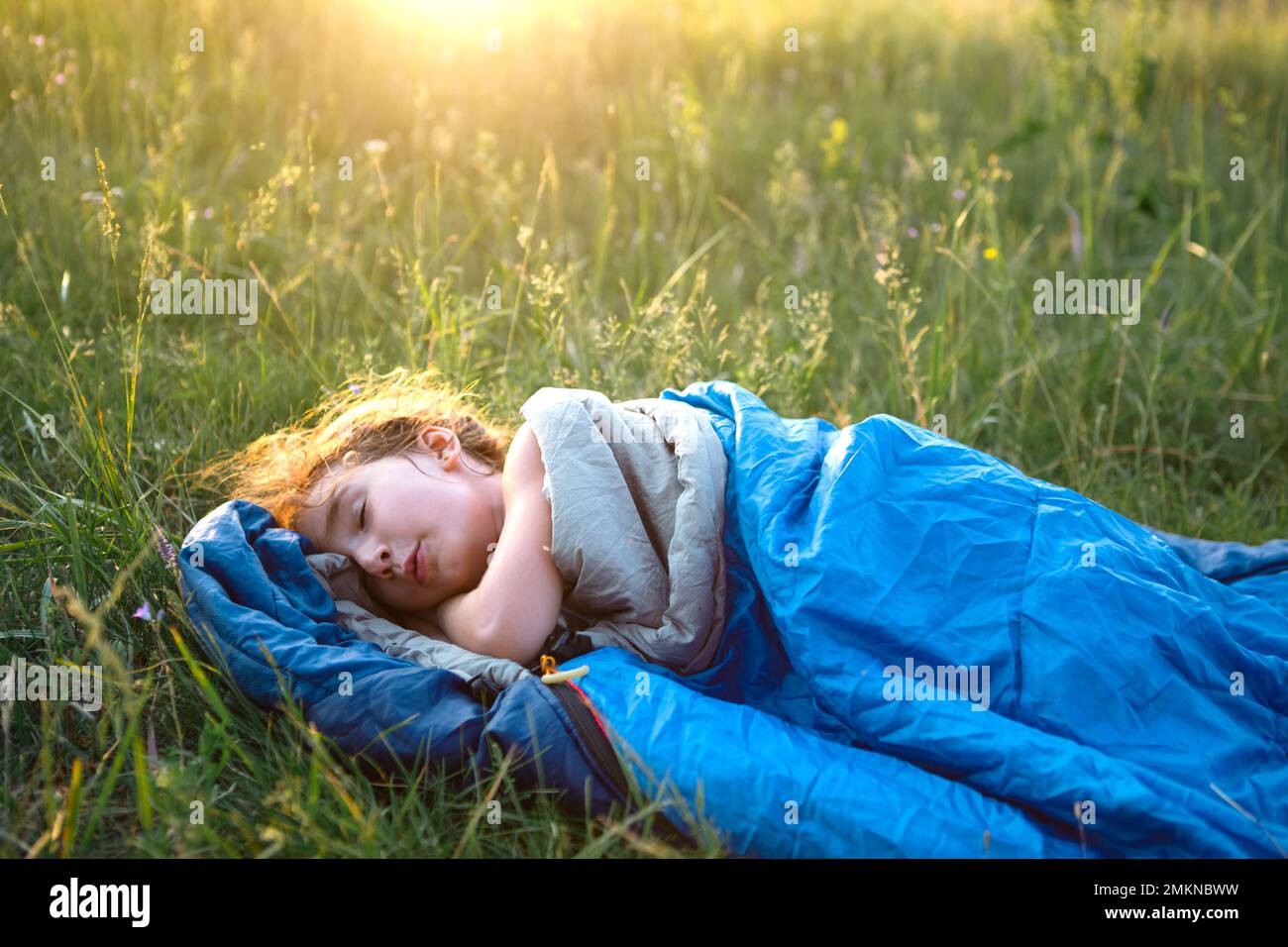 Children sleeping in tent hi-res stock photography and images - Alamy