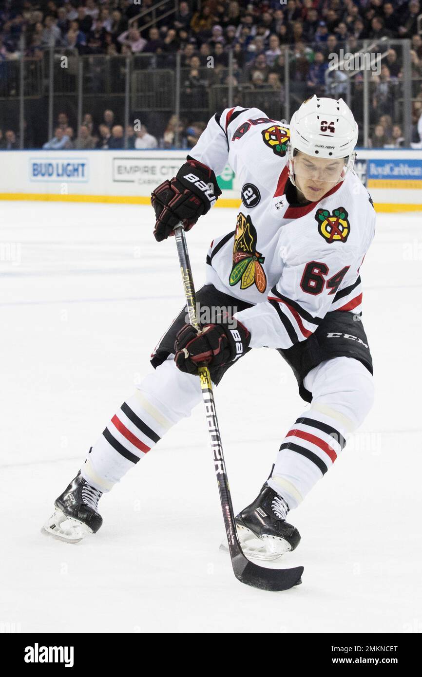 Chicago Blackhawks center David Kampf controls the puck in the first ...
