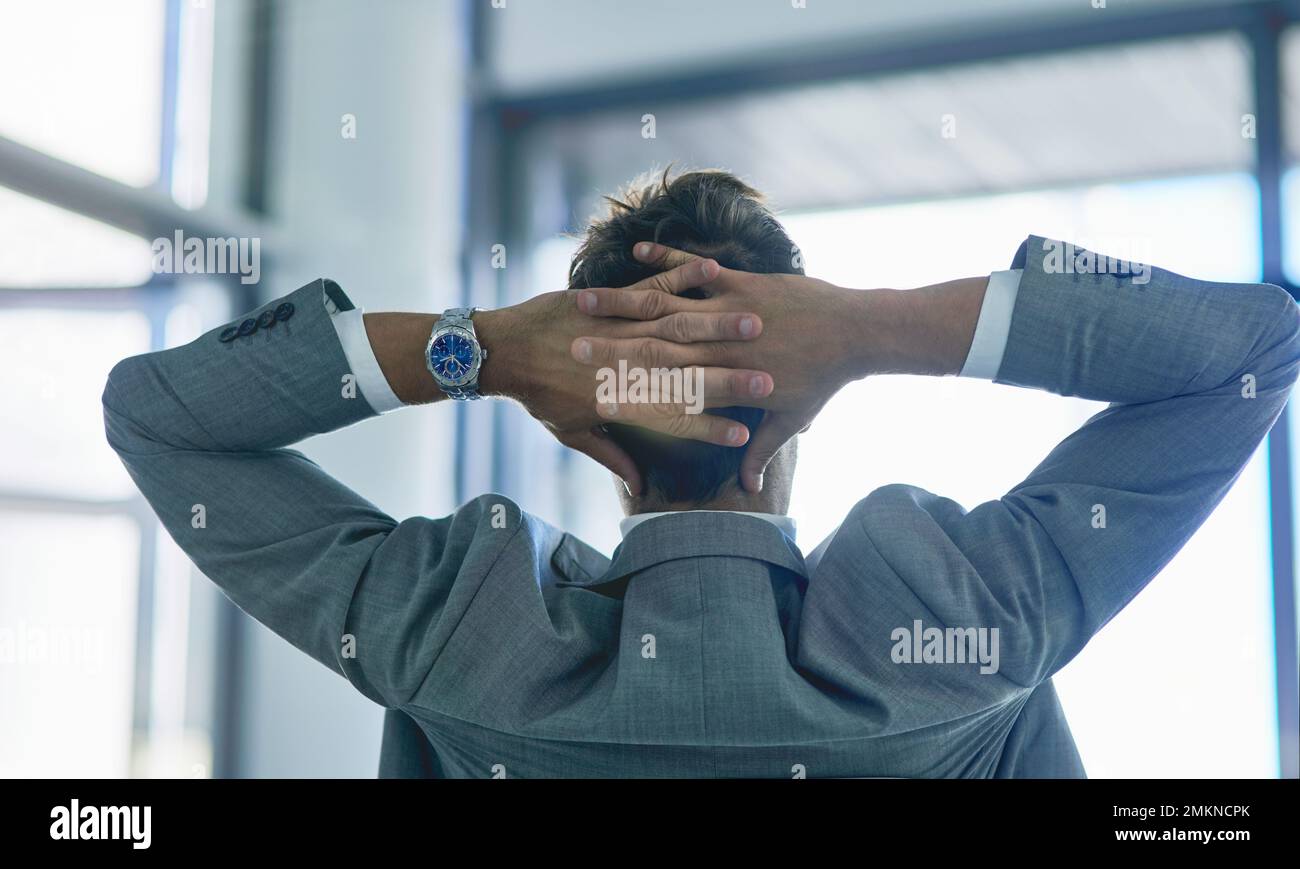 Man leaning back in chair hi-res stock photography and images - Alamy