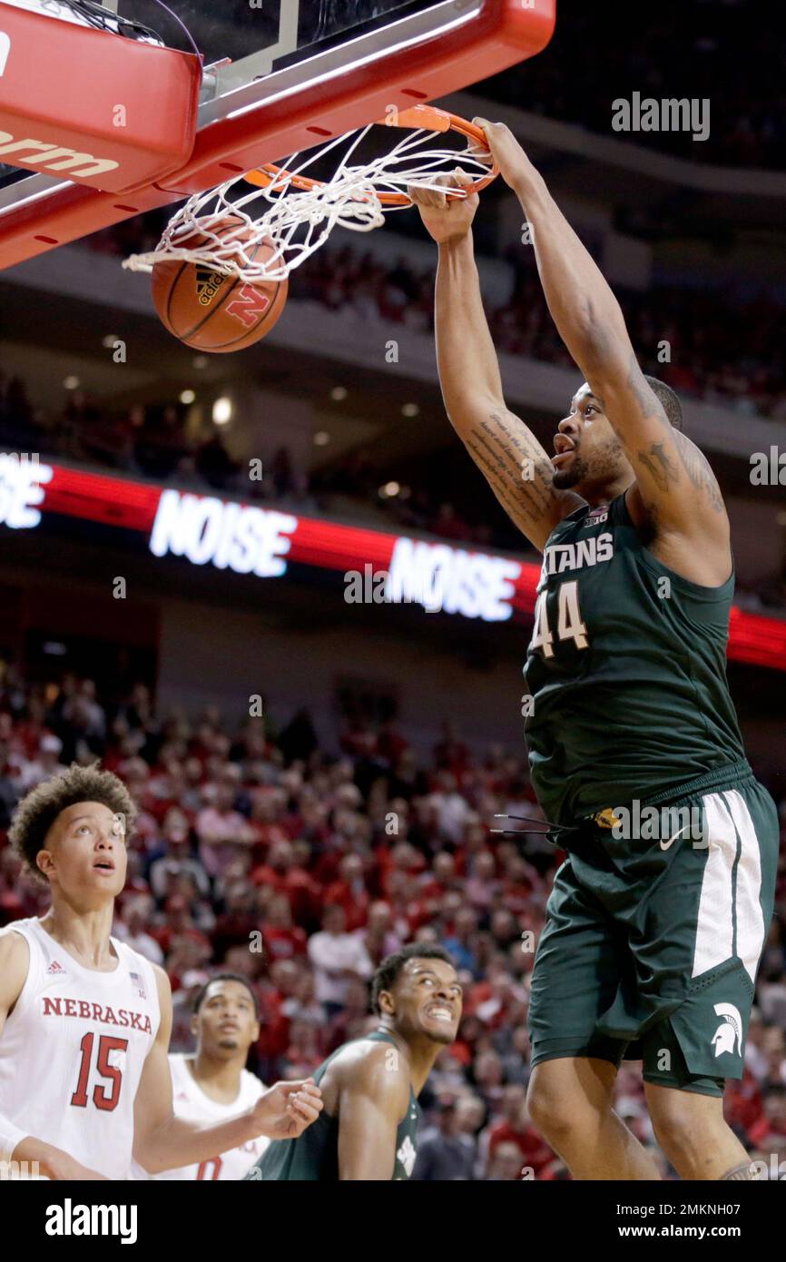 Michigan State's Nick Ward (44) dunks as Nebraska's Isaiah Roby (15 ...