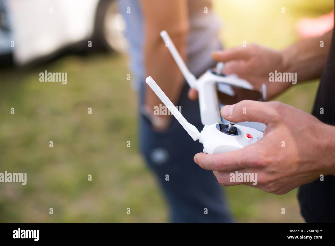 Quadrocopter control from a joystick with outdoor antennas. Shooting ...