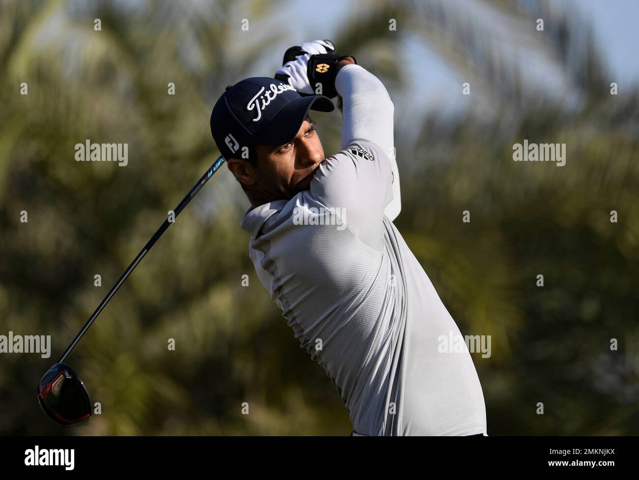 Aaron Rai of England tees off on the 14th hole in round two of the Abu ...