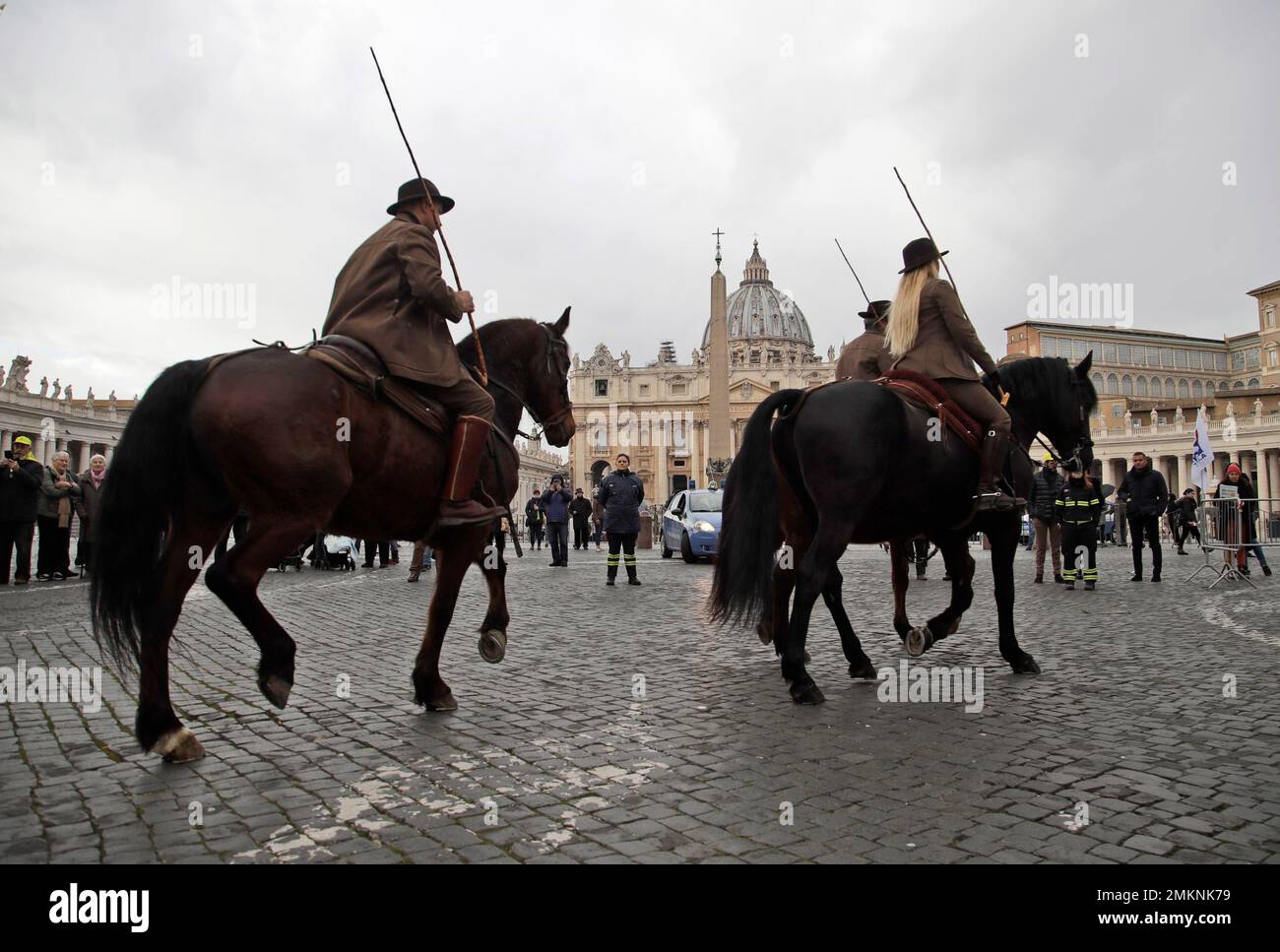 Butteri (Italian cowboys) ride their horses during a parade in front of ...