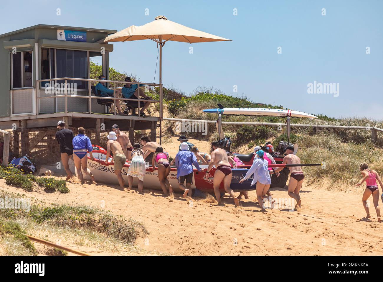 Sydney Northern beaches surfboat carnival at North Narrabeen beach, surfboat crews remove ...