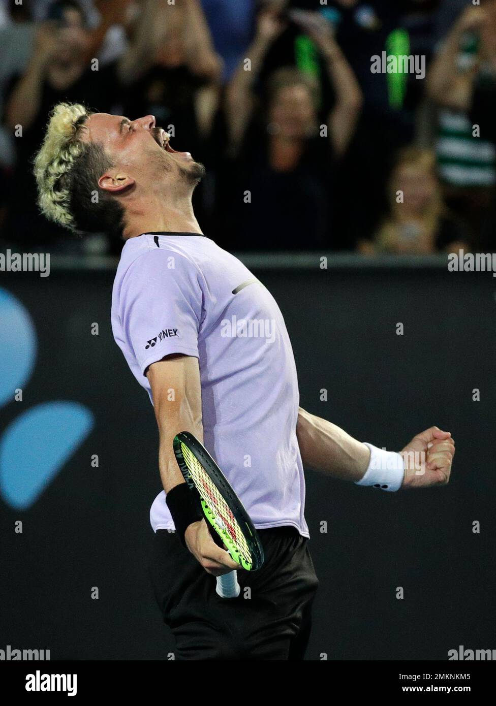 Australia's Alex Bolt celebrates after defeating France's Gilles Simon ...