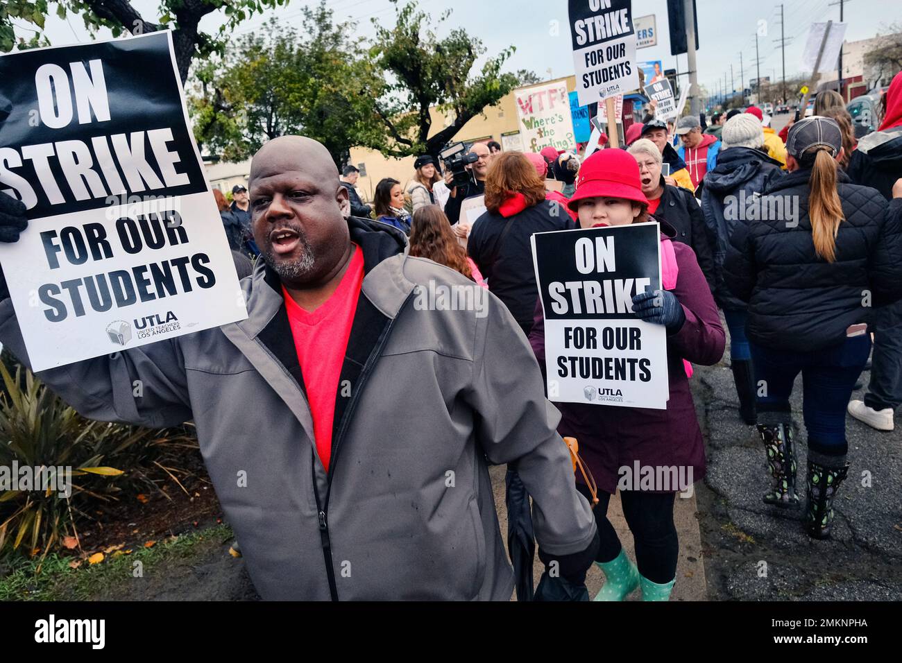 Teachers and students carry signs and picket in front of Hamilton High ...