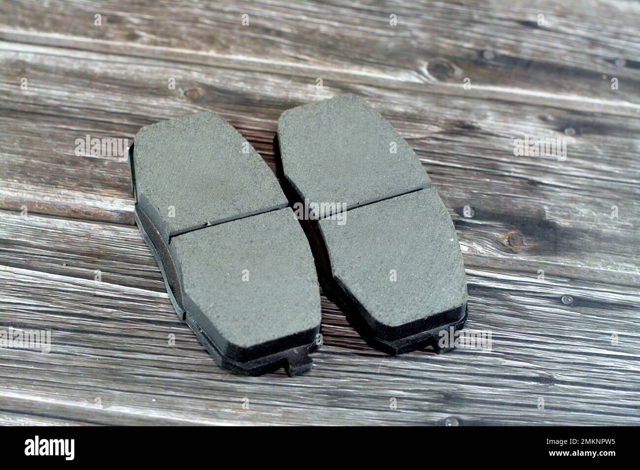 selective focus of a set of new unused auto brake pads for a car ...