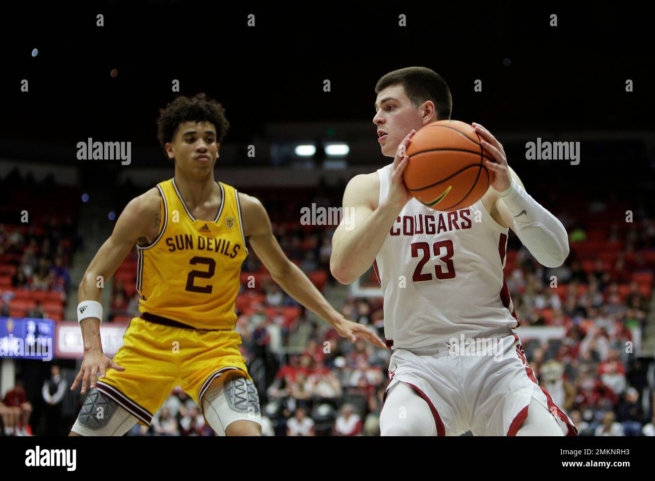 Washington State forward Andrej Jakimovski (23) controls the ball while ...