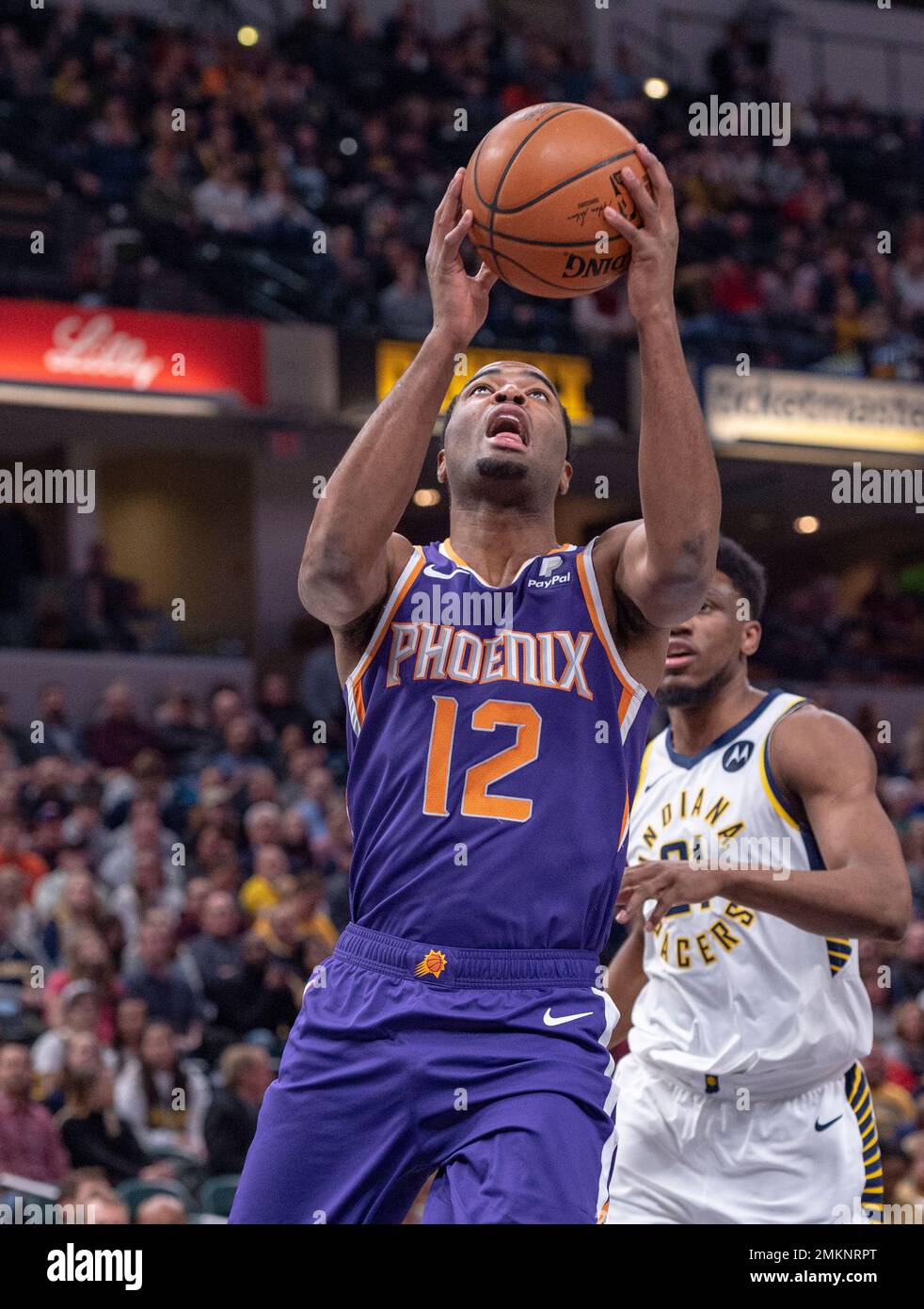 Phoenix Suns forward T.J. Warren (12) shoots during the first half of ...